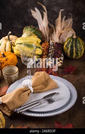 Fall table setting for Thanksgiving day celebration Stock Photo - Alamy