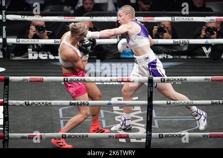 Lauren Price and Timea Belik exchange punches during their welterweight ...