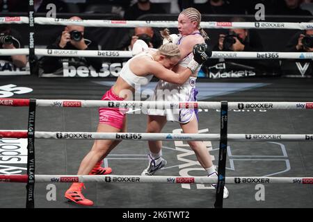 Lauren Price and Timea Belik exchange punches during their welterweight ...