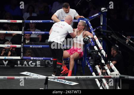 Lauren Price and Timea Belik exchange punches during their welterweight fight at The O2, London ...