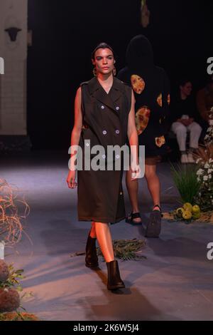 A model dressed in a design by Wuurn of Kanak during the Ganbu Marra ...