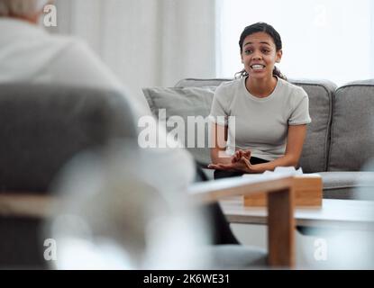 Young hispanic woman working at psychology clinic smiling cheerful ...