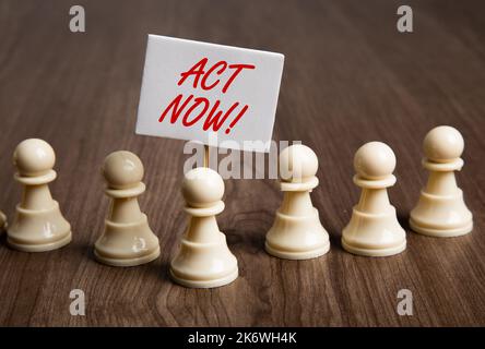 Chess pawn protester holding a sign banner with the message FREE SPEECH ...