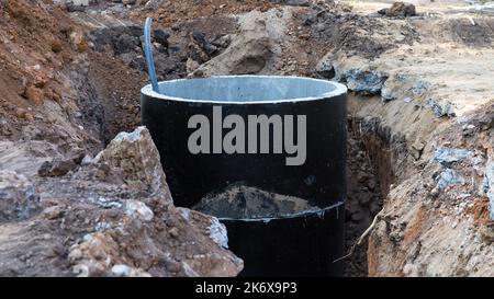 Reinforced concrete building rings set deep into the ground Stock Photo ...
