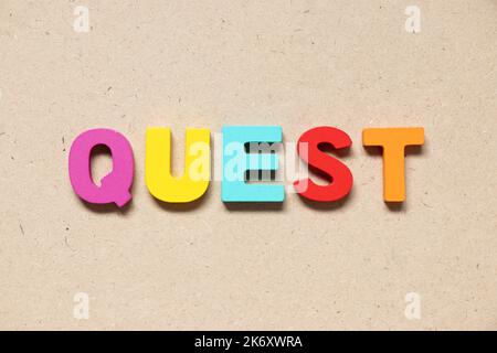 Alphabet letter in word quest on wood background Stock Photo - Alamy