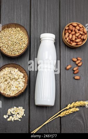 Wheat cereal grains spikelets on dark wooden background Stock Photo - Alamy