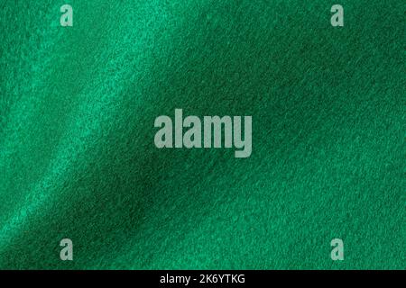 Green hue color felt textile fabric texture background. Abstract ...