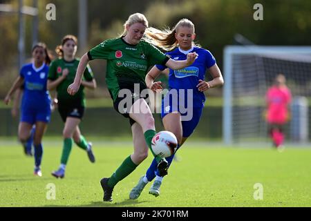 Rhianne Oakley of Cardiff City Women FC is tackled by Rebecca Mathias ...