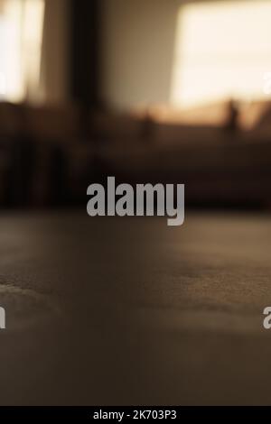 A low angle closeup shot of sunrise over a green scenery with high rise ...