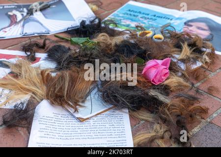 Locks of hair and head scarf Stock Photo - Alamy