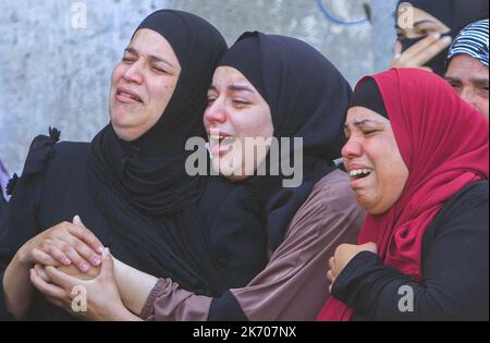 Palestinians mourn during the funeral of Hassan Ahmed Jamil Moussa,19 ...