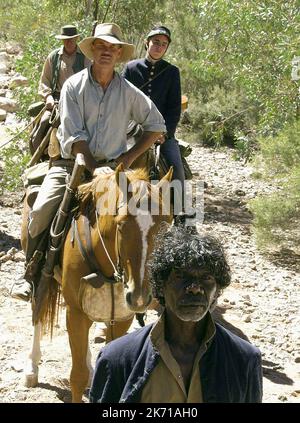 DAVID GULPILIL, GARY SWEET, DAMON GAMEAU, THE TRACKER, 2002 Stock Photo ...