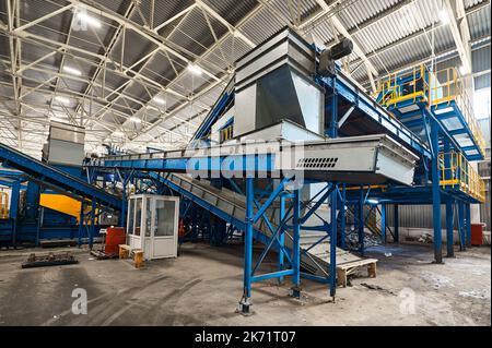 Large production line with conveyors carrying trash at plant Stock Photo - Alamy
