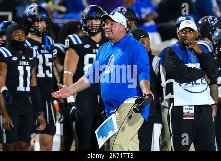 Duke head coach Mike Elko, front, walks along the sideline during the ...