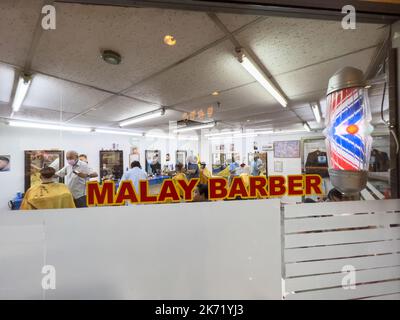 Busy barbers shop Stock Photo - Alamy