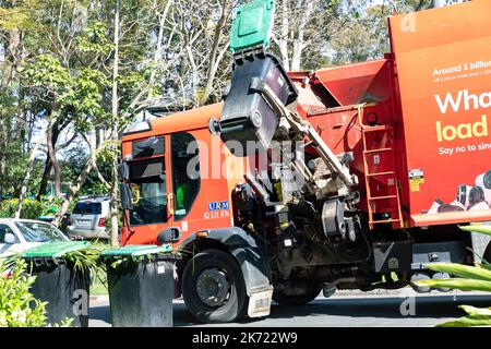 Australia, council vehicle picks up and empties green waste vegetation ...