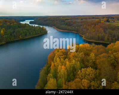 Autumn view with Asveja lake and colorful mapple trees Stock Photo - Alamy