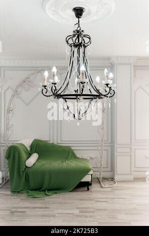 Interior of light room with comfortable pouf and shelf units near white ...