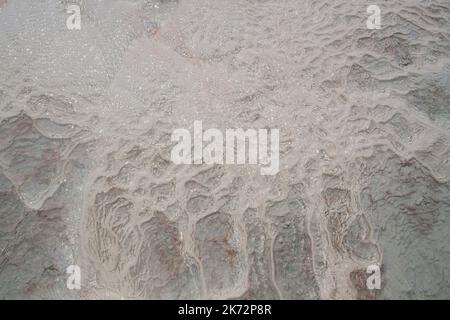 Limestone floor with water in Pamukkale calcium travertine in Turkey ...