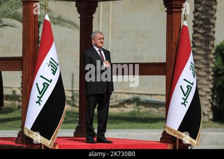 Baghdad, Iraq. 17th Oct, 2022. Abdul Latif Rashid (L) arrives for his ...