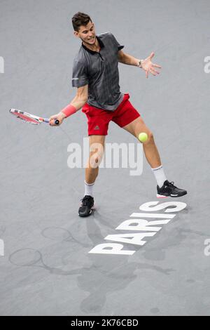 Aurelien Morissard / IP3; Dominic Thiem of Austria plays a backhand ...
