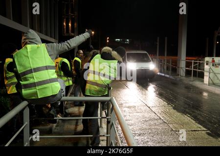Demonstration of yellow vests and blockage or slowing down of car ...