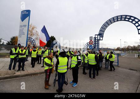 Demonstration of yellow vests and blockage or slowing down of car ...