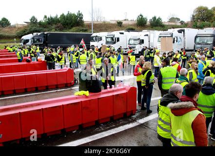 Demonstration of yellow vests and blockage or slowing down of car ...