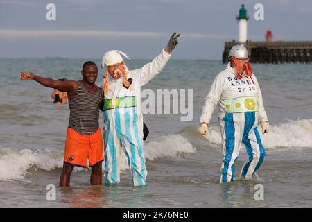 People enjoy the New Year's Bathing Ritual around France on New Year's ...