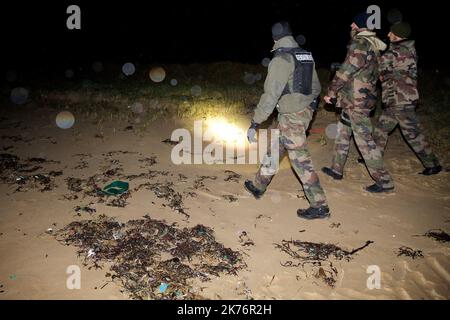 Night patrol against migrants on the beach Stock Photo - Alamy