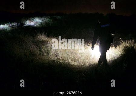 Night patrol against migrants on the beach Stock Photo - Alamy