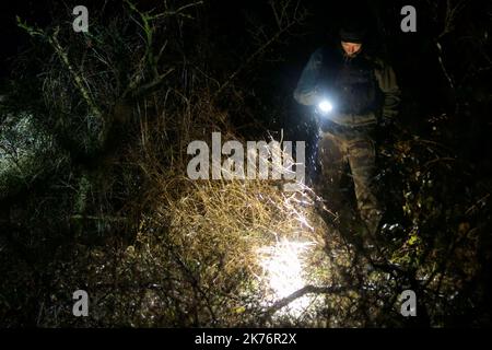 Night patrol against migrants on the beach Stock Photo - Alamy