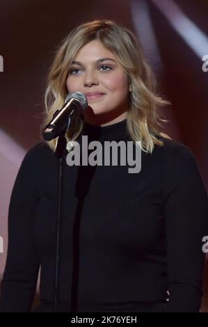 French singer Louane performs during the half timeof the Six Nations ...