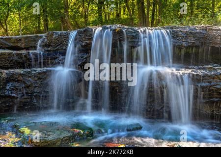 A stunningly beautiful stepped waterfall shot with a slow shutter speed ...