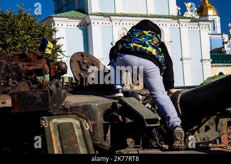 Ukrainian children have fun on the destroyed Russian military equipment ...