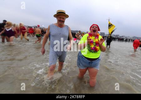 People in France take part in the New Year's Day Dip in the northern ...