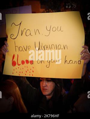 The sign for the Iranian embassy is seen on the ground outside the ...
