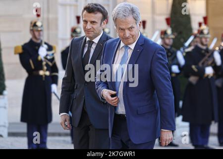 France's President Emmanuel Macron shakes hands with Lord Mayor of the ...