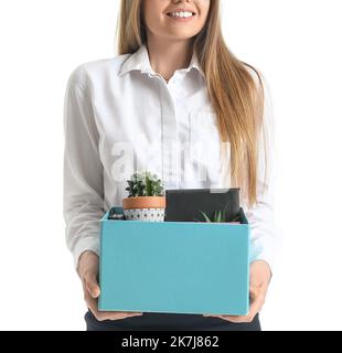 Happy unemployed woman with box of personal office belongings on white ...