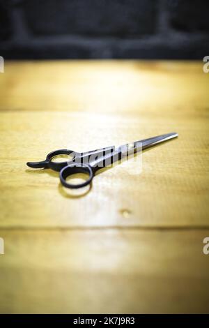 Plastic hair cutting scissors Isolated on wooden Background Stock Photo ...