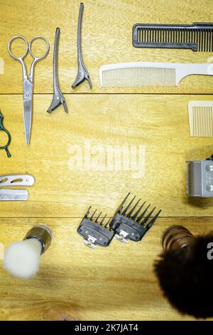 Vintage tools of barber shop on light wooden background Stock Photo - Alamy