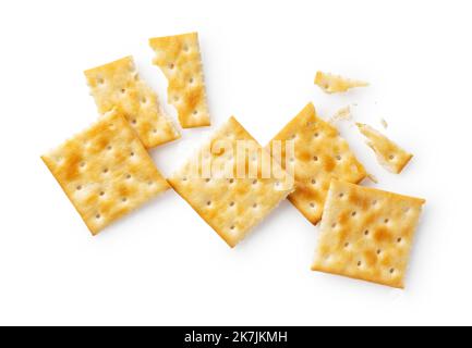 Broken crackers placed on a white background. Viewed from above Stock ...