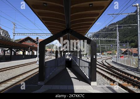 Railway station and Goldenpass train in Gstaad, Switzerland Stock Photo ...