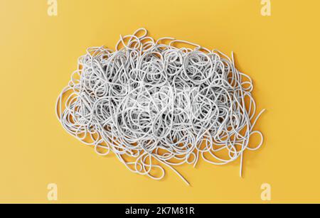 A tangled pile of string or wire. Confusion and thought process concept ...