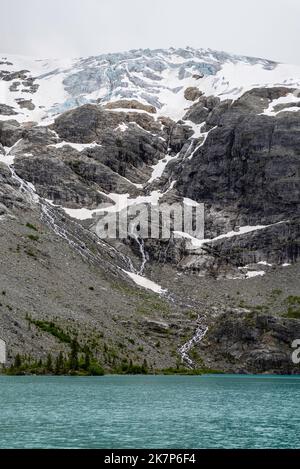 Photograph of Upper Joffre Lake and Matier Glacier on an overcast ...