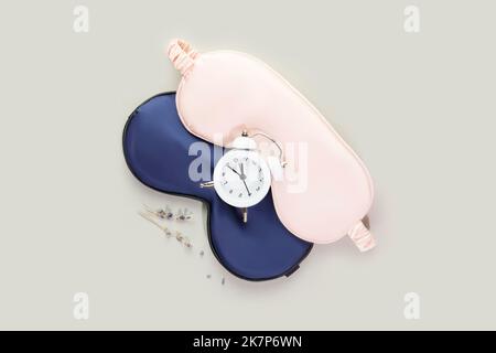 Masks for sleep, alarm clock with time for sleep and lavender flowers ...