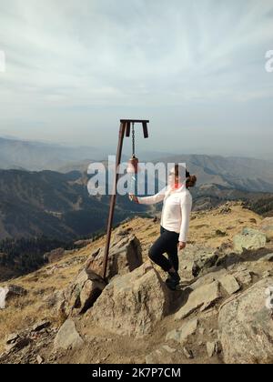 WOMAN RINGS BELL Stock Photo - Alamy