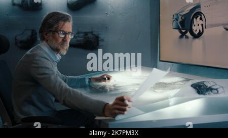 Automotive Engineer Using Digital Tablet Computer with Augmented ...