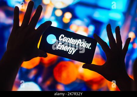 In this photo illustration, the CenterPoint Energy company logo is seen ...