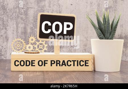 Concept image of Business Acronym COP as Cost Of Production written ...